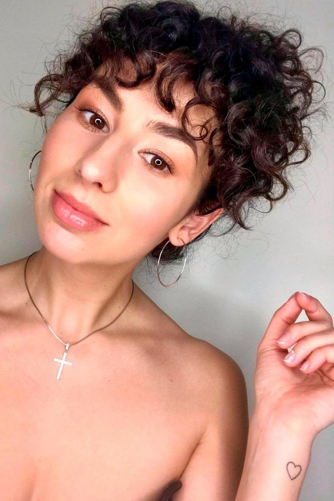 Implement Curly Bangs In Your Outlook and Enjoy The Flattering Effect