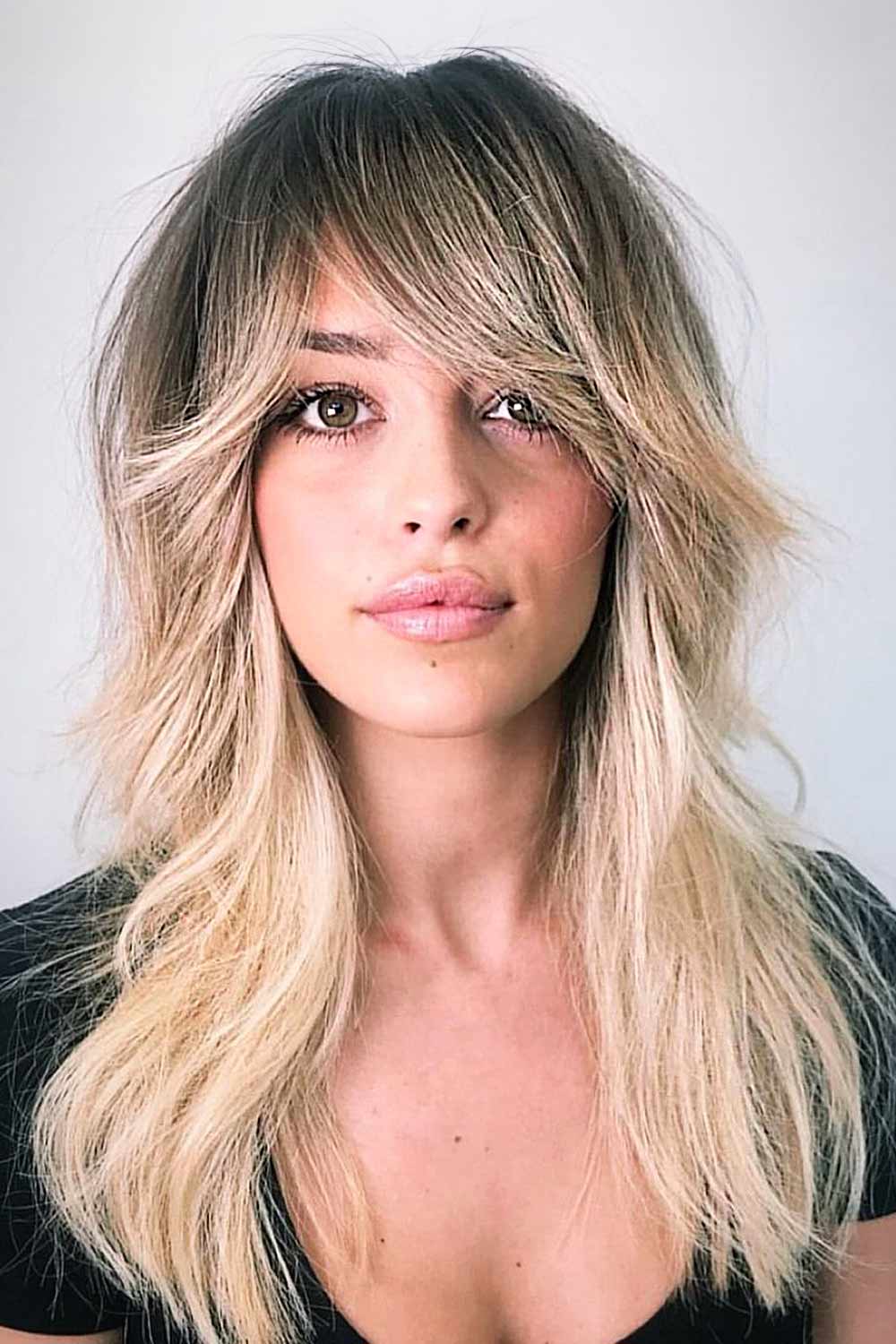 Creative Ways To Rock Your Face Framing Bangs