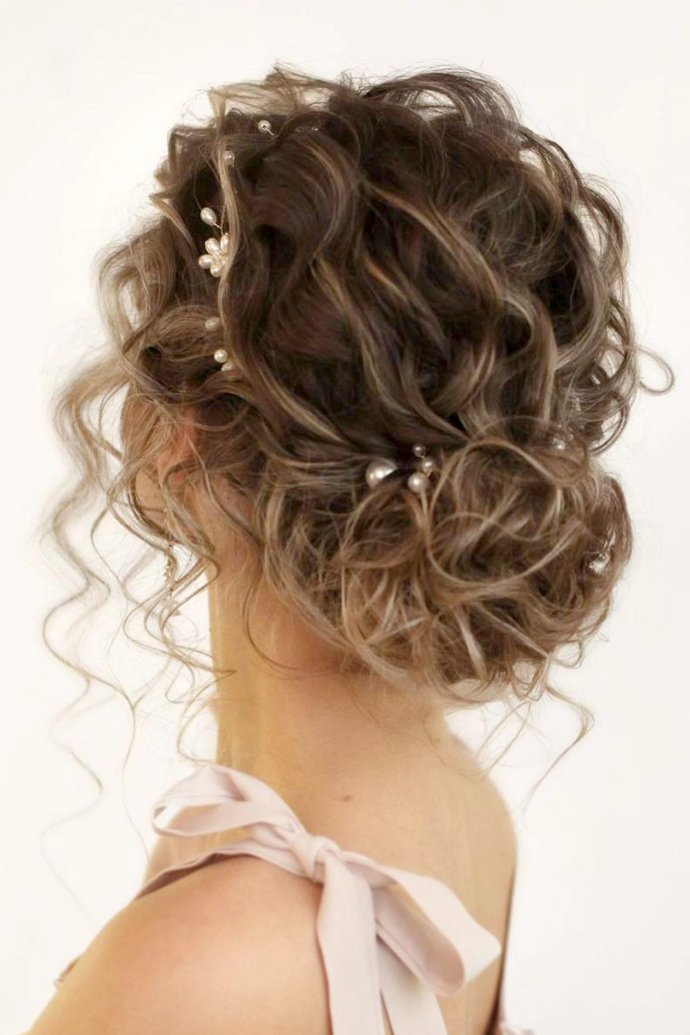 The Trendiest Ways To Beautify Your Long Curly Hair